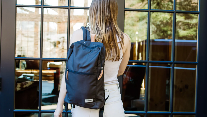 5 Stylish & Functional Ways to Wear a Backpack